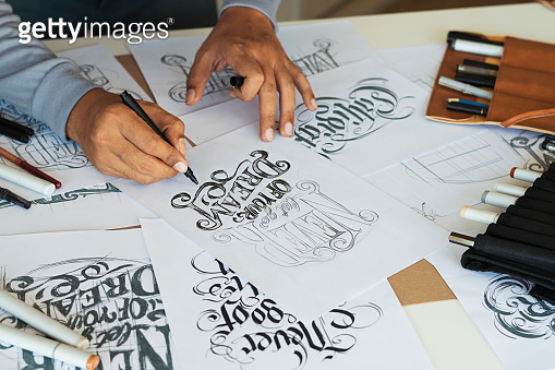Typography Calligraphy artist designer drawing sketch writes letting ...