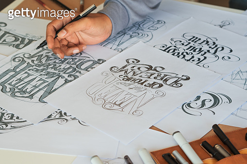 Typography Calligraphy artist designer drawing sketch writes letting ...