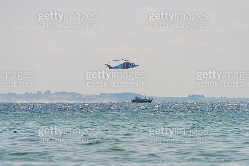 Search and rescue helicopter AgustaWestland AW139 SE-JRL performing ...