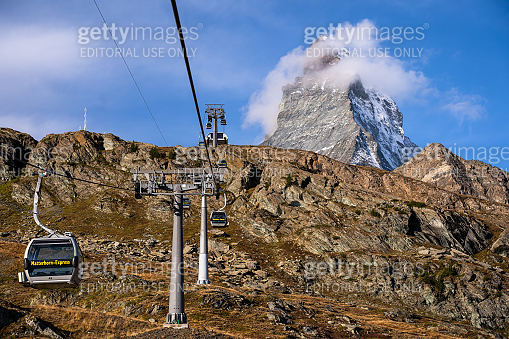 The Matterhorn express cable car brings tourists at the foot the of ...