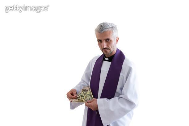 Greedy catholic priest counting money american dollars. Isolated on ...