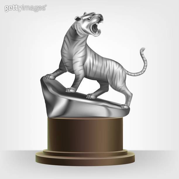 The winning trophy is a silver tiger statue.Silver tiger.illustration ...