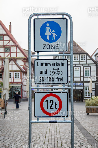 sign at entrance o shopping area shows only traffic for supply is ...