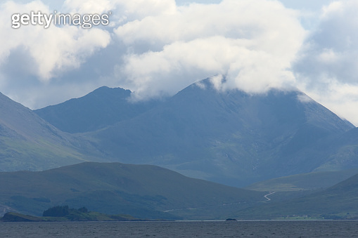 Cloud topped scottish mountain on the isle of skye. Remote wilderness ...