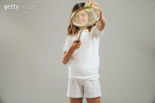Girl Using Tennis Racket 이미지 1317759073 게티이미지뱅크
