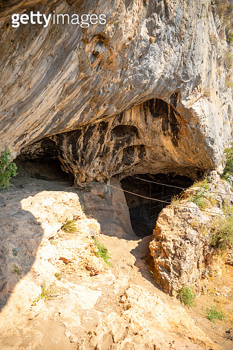 Inside view of Karain Cave in Antalya, with natural stalactites and ...