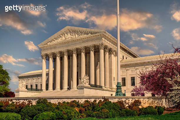 U.S. Supreme Court Building with Blue, Yellow and Orange Sunset Sky ...