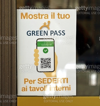 Green pass sign on window bar. It allows to enter only to vaccinated ...