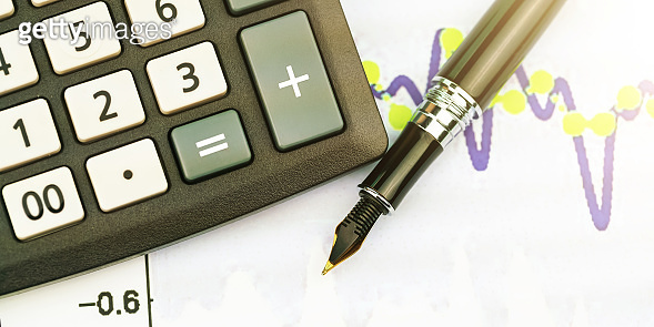 vintage calculator edge with white keys lies near pen 이미지 (1309082499 ...