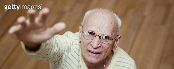 Unhappy senior man reach hand looking for help and support view from ...