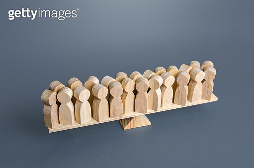 A group of people on the scales. Sharing a common position between ...