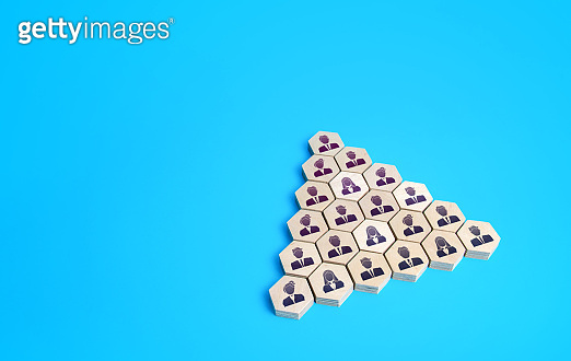 Company employees in pyramid order formation. Social organizations ...