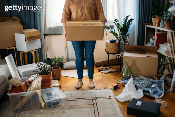Moving out: Anonymous Caucasian Plus Size Woman Standing in the Middle ...