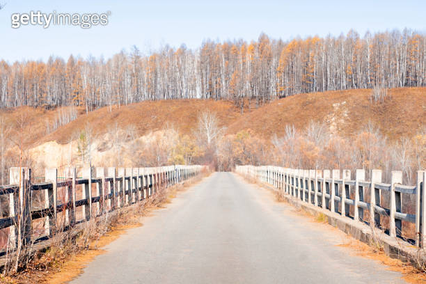A bridge on the river between two mountains with forests 이미지 ...