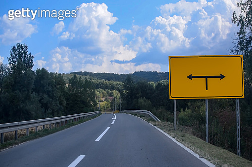 Asphalt road with two lane on a sunny day, blue cloudy sky background ...