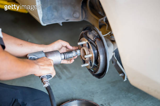 Repair mechanic hands during maintenance work to pneumatic gun to ...
