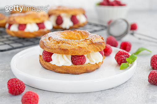 Choux pastries. Choux rings with cream of cream cheese or cottage ...