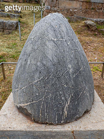 The sacred stone Omphalos (navel of the earth) is a tourist attraction ...
