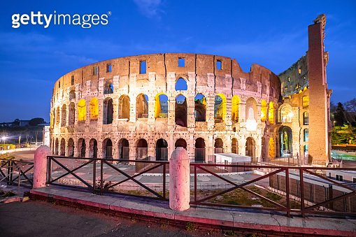 Colosseum of Rome empty street at dawn view, most famous landmark of ...