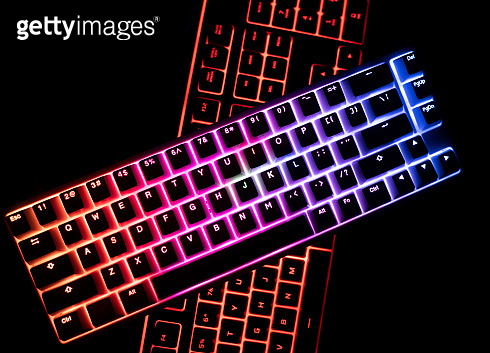 top view of two illuminated RGB keyboards in the dark 이미지 (1309055745 ...
