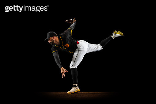 Professional baseball player, pitcher in sports uniform and equipment ...