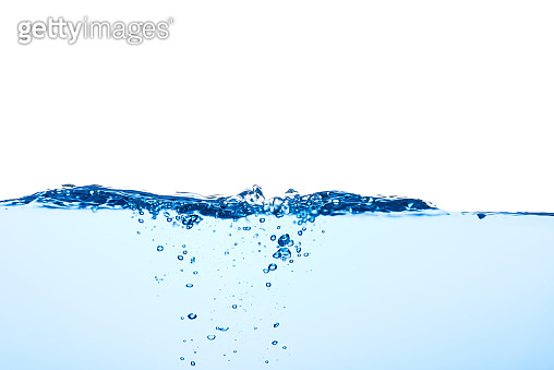 Light blue water wave with air bubbles and a little bit splashed ...