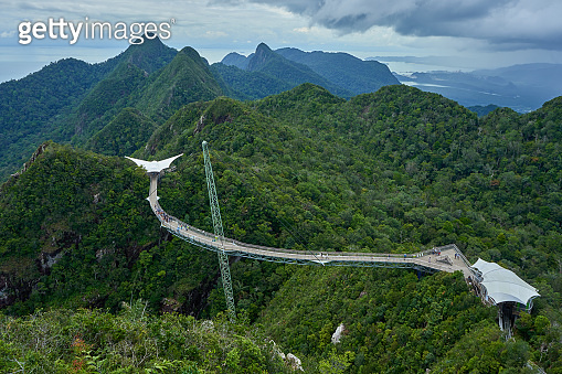 Popular tourist attraction. Bridge over the abyss on one pillar ...
