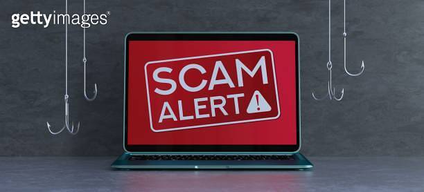 Scam Alert Warning Sign on the Laptop Screen and Hook Concept ...