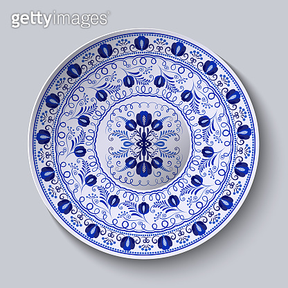 Porcelain plate with blue round ornament in ethnic style. Decorative ...