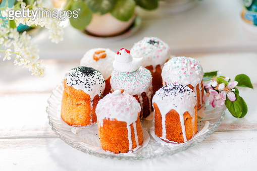 Religious food. Group of decorated Easter cakes on a platter with apple ...