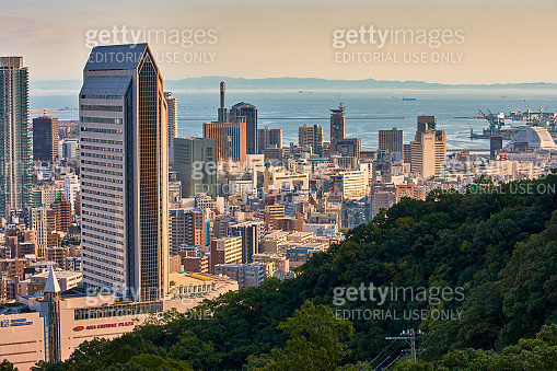 Kobe city skyline with Kobe port and Osaka bay in the distance in Kobe ...