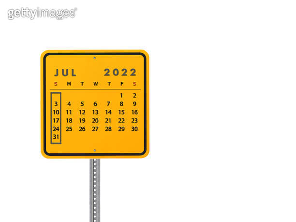 2022 July Calendar on Metal Yellow Road Sign Against White Background ...