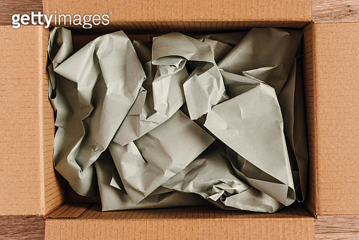 Cardboard boxes with crumpled paper inside for packaging goods from ...
