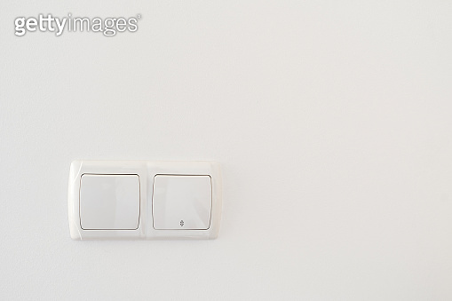 Double mechanical light switch button on wall 이미지 (1345697588) - 게티이미지뱅크