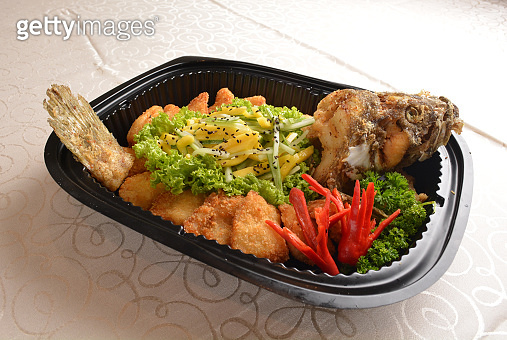 deep fried whole grouper fish with fresh Thai mango fruit salad and ...