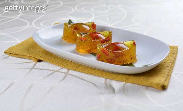 chinese dessert cold jelly with gui Hua flower yellow pudding in yuan ...