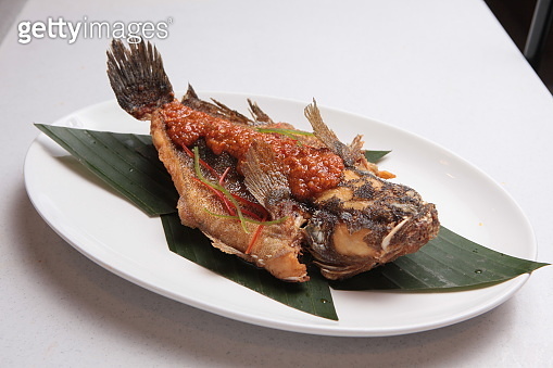 deep fried whole grouper fish seafood with peranakan nonya spicy chilli ...