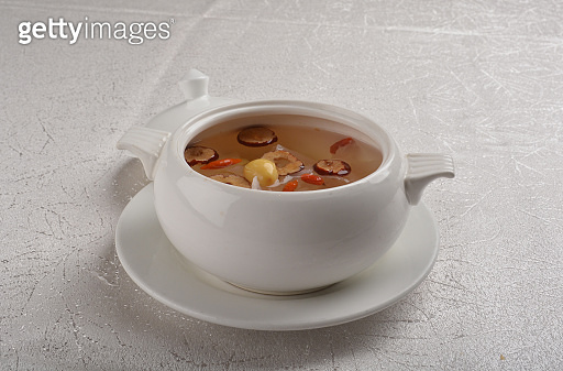 Chinese chilled hashima and herbal red dates sweet soup in white bowl ...