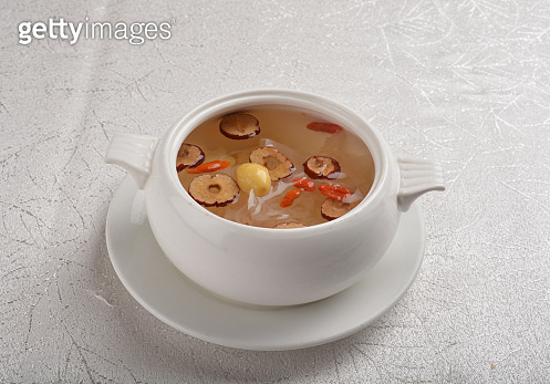 Chinese chilled hashima and herbal red dates sweet soup in white bowl ...