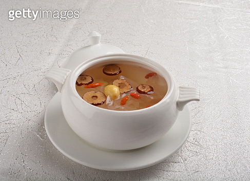 Chinese chilled hashima and herbal red dates sweet soup in white bowl ...