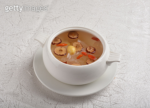 Chinese chilled hashima and herbal red dates sweet soup in white bowl ...