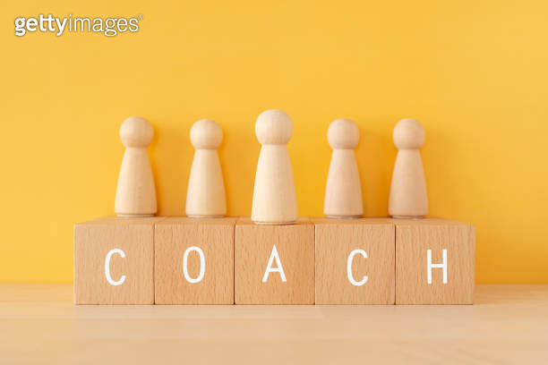COACH; Wooden blocks with "COACH" text of concept and human toys. 이미지 ...