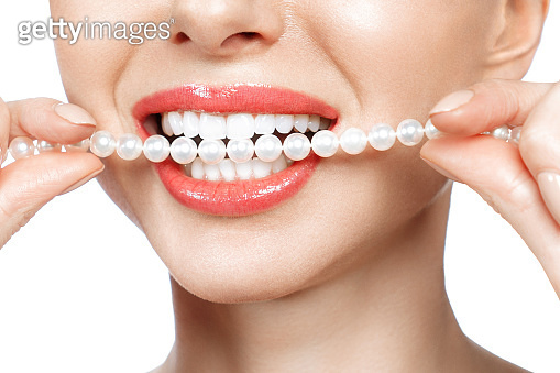Beautiful female teeth smile and pearl necklace, Dental Health Concept ...