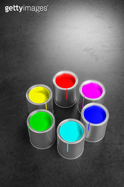 Paint pots building a color wheel with the RGB primary colors of the ...