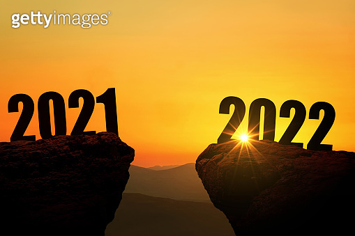 New Year's Eve 2022 on the mountain at sunset, concept. 2021 and 2022 ...
