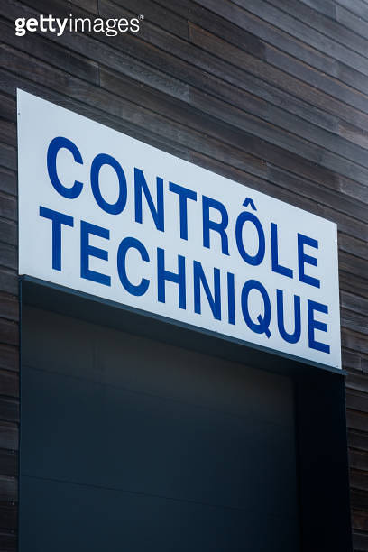 French "Technical control" sign, on the front of a safety inspection ...
