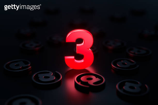 Red Number Three Glowing Amid Black At Symbols On Black Background ...