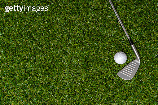 White golf ball and stick on green grass. Horizontal sport poster ...