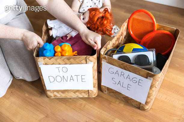 Boxes of things for a garage sale and donation. Decluttering, cleaning ...