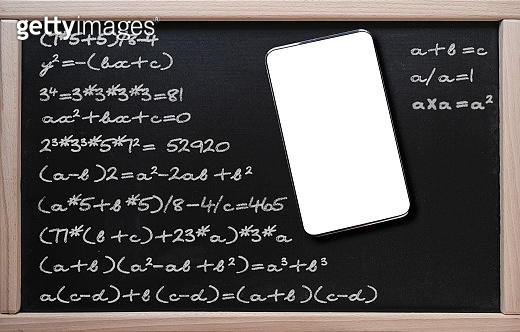 . Online learning, math classes. Tablet on the background of a class ...